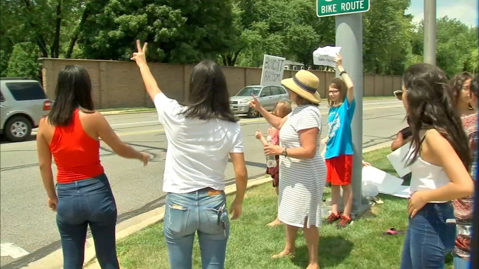 'Go back to their country:' Protesters held after Naperville Bucky's ...