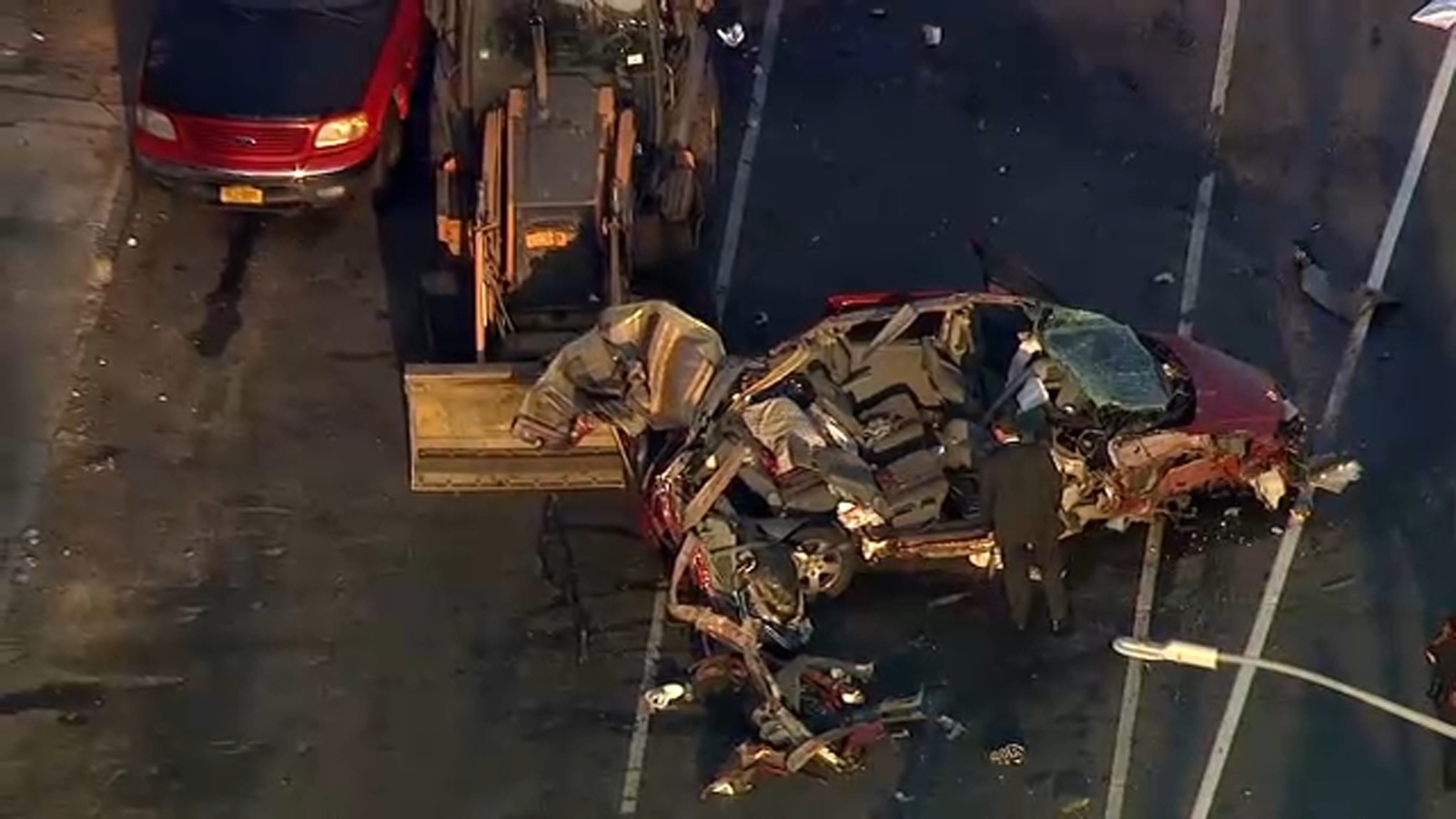 Passenger killed, driver hurt when car crashes into backhoe in East New ...