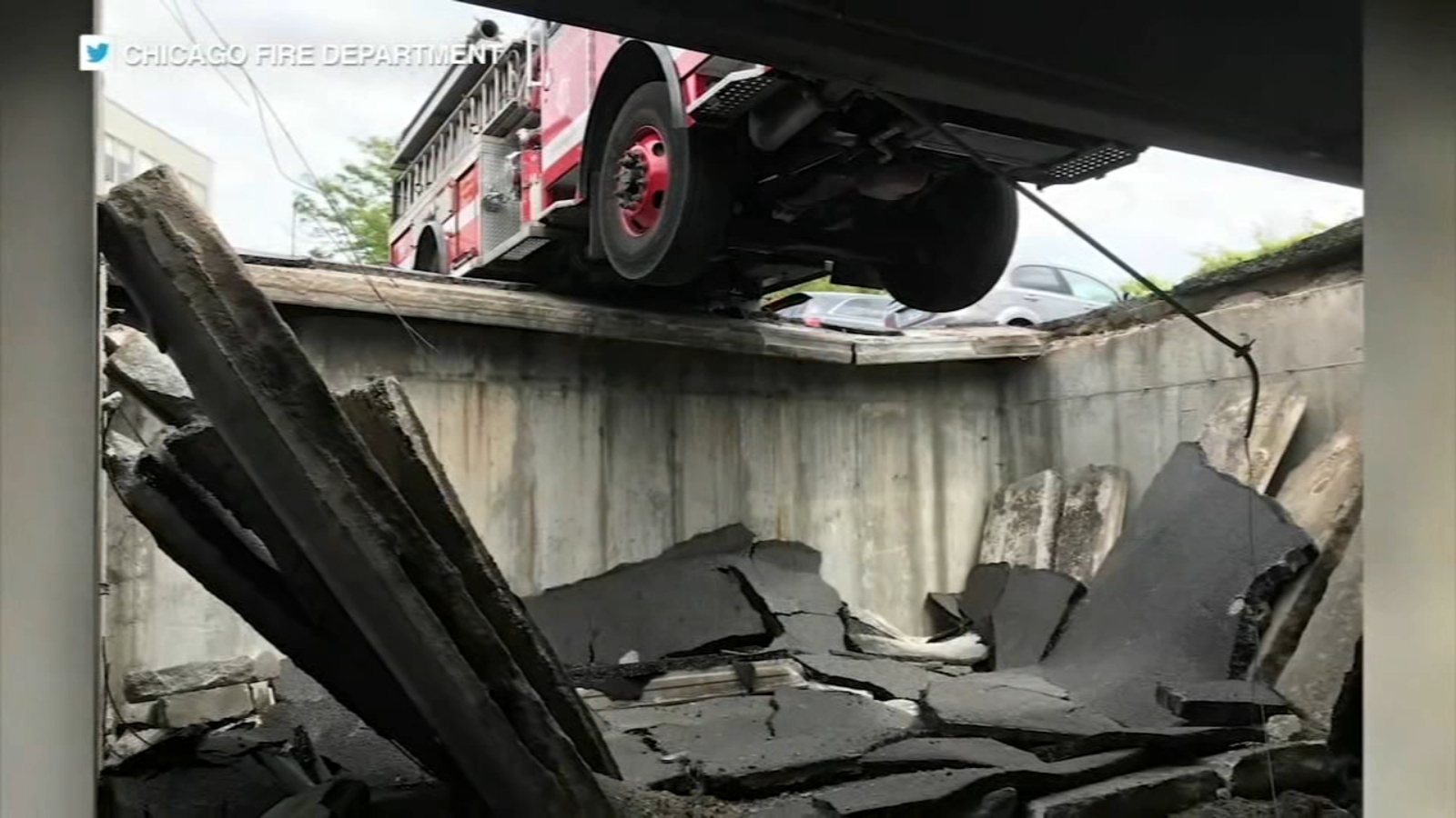 Chicago Fire Department engine removed from partially collapsed parking ...