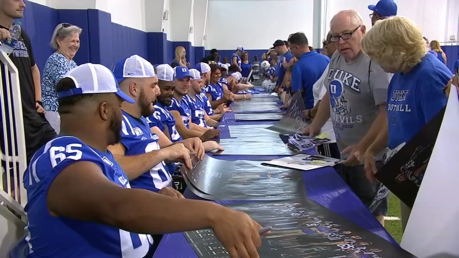 Team picture with fans part of fun as supporters meet Blue Devils ...
