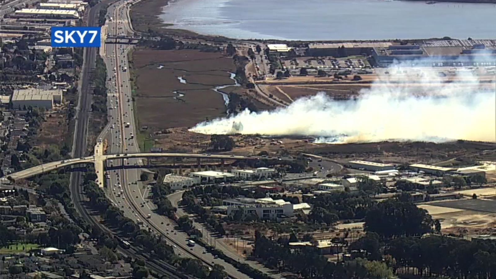 Crews contain grass fire near businesses in Richmond - ABC7 San Francisco