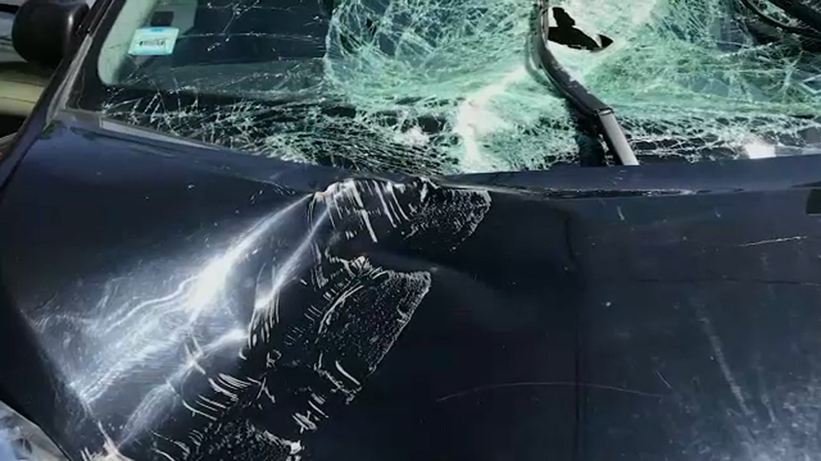 Uber driver hurt when concrete falls off overpass files $10 million ...