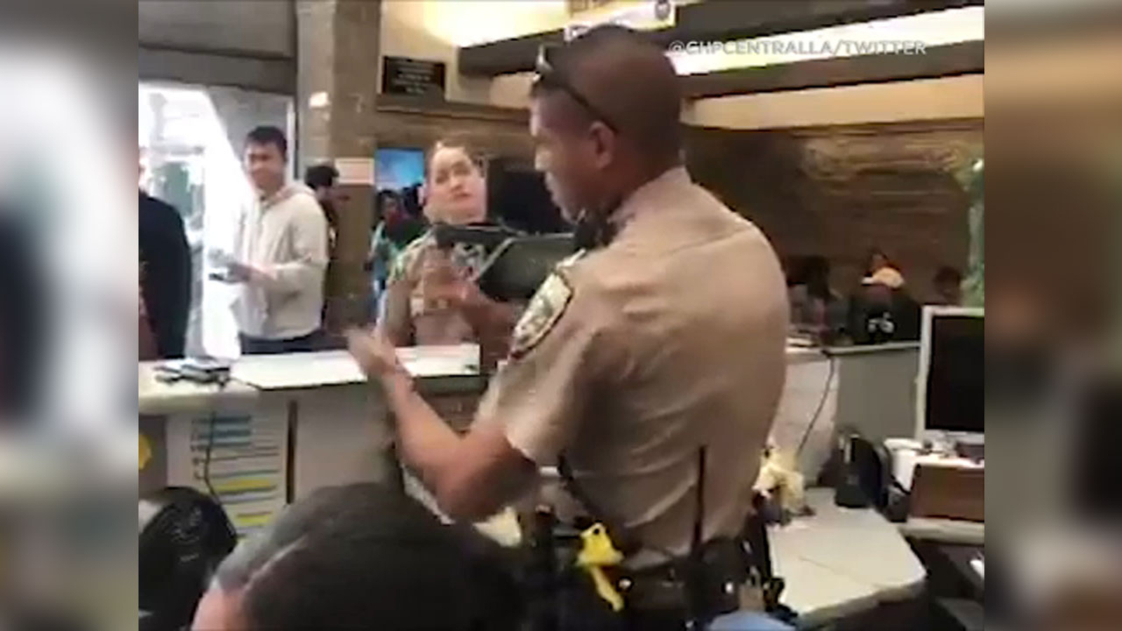 CHP officer helps deaf woman communicate with DMV workers in LA, pays ...