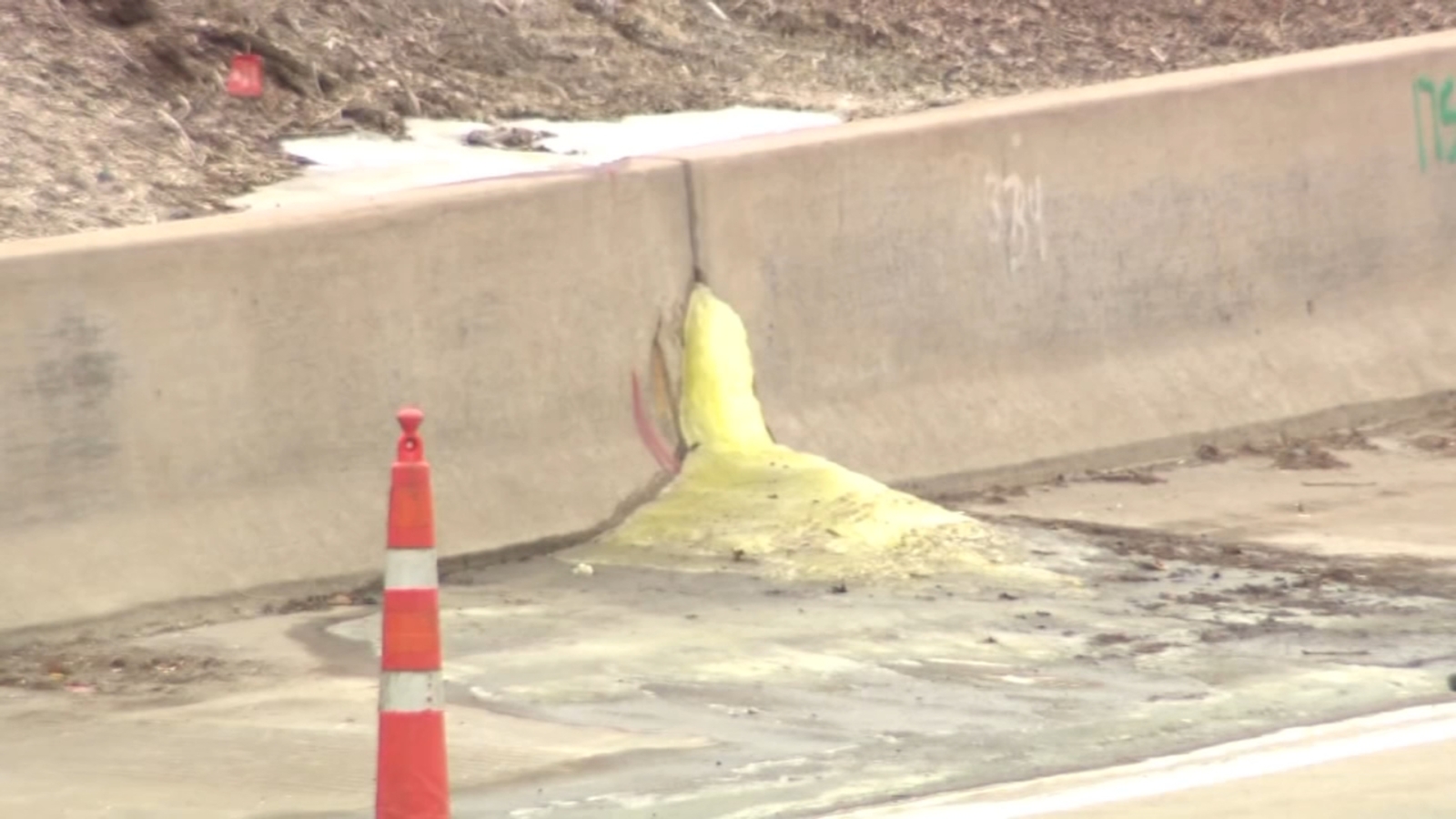 Hazardous green ooze found seeping onto Michigan highway, causing road ...