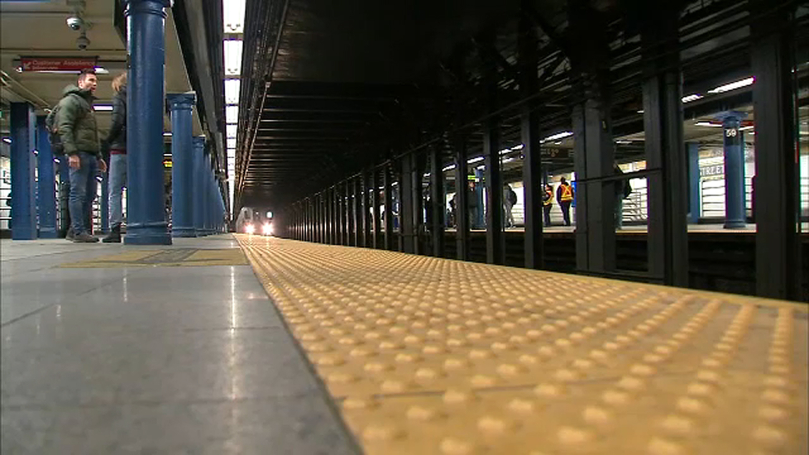 Woman rescued after fainting onto tracks at East Side subway station ...