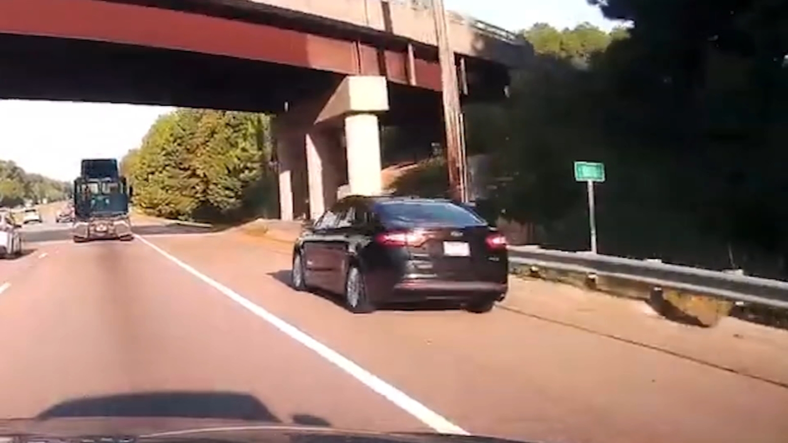 Driver caught on camera passing traffic on I-540 shoulder arrested for ...
