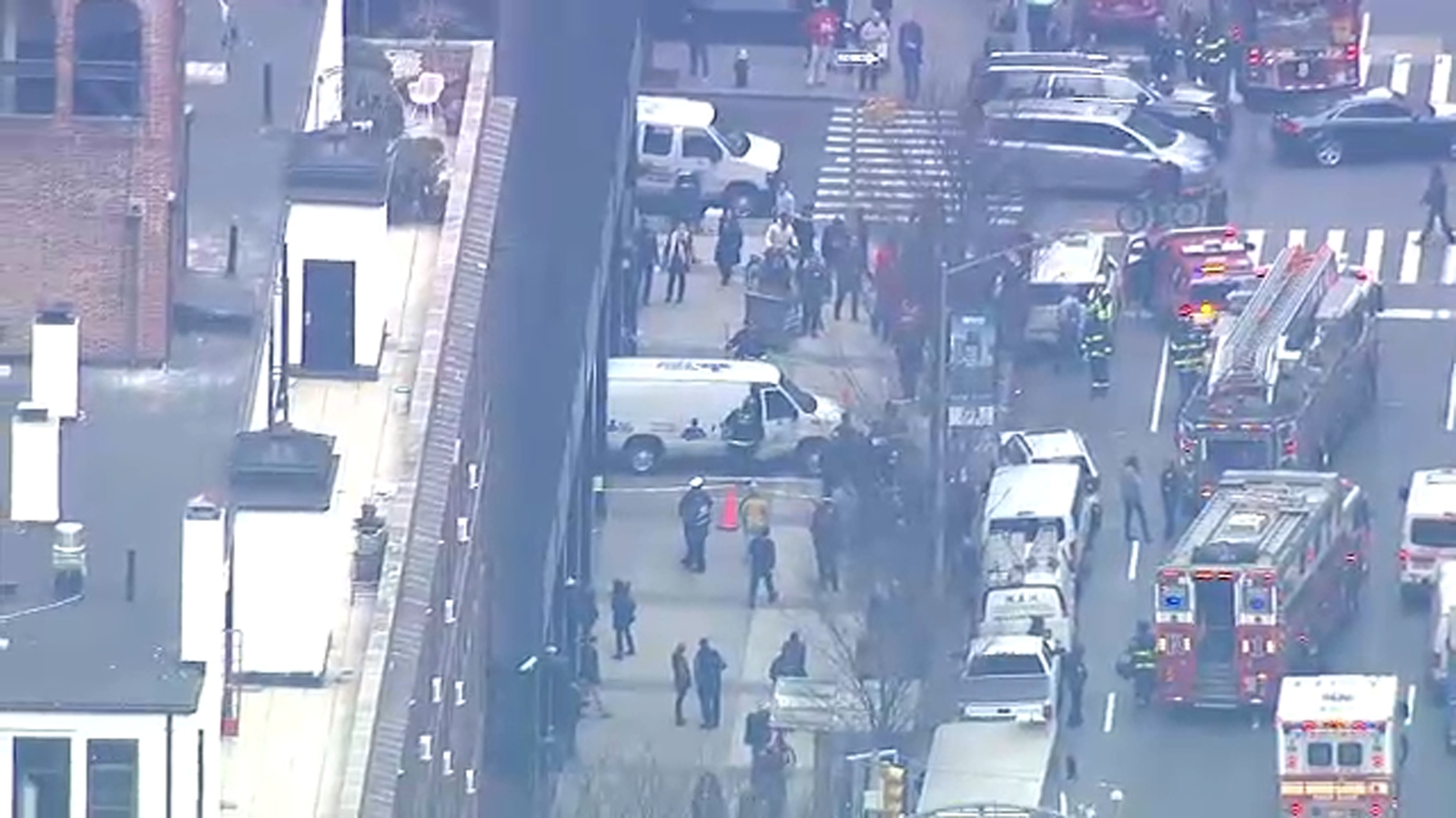 Van loses control, crashes into high-rise building in Manhattan - ABC7 ...