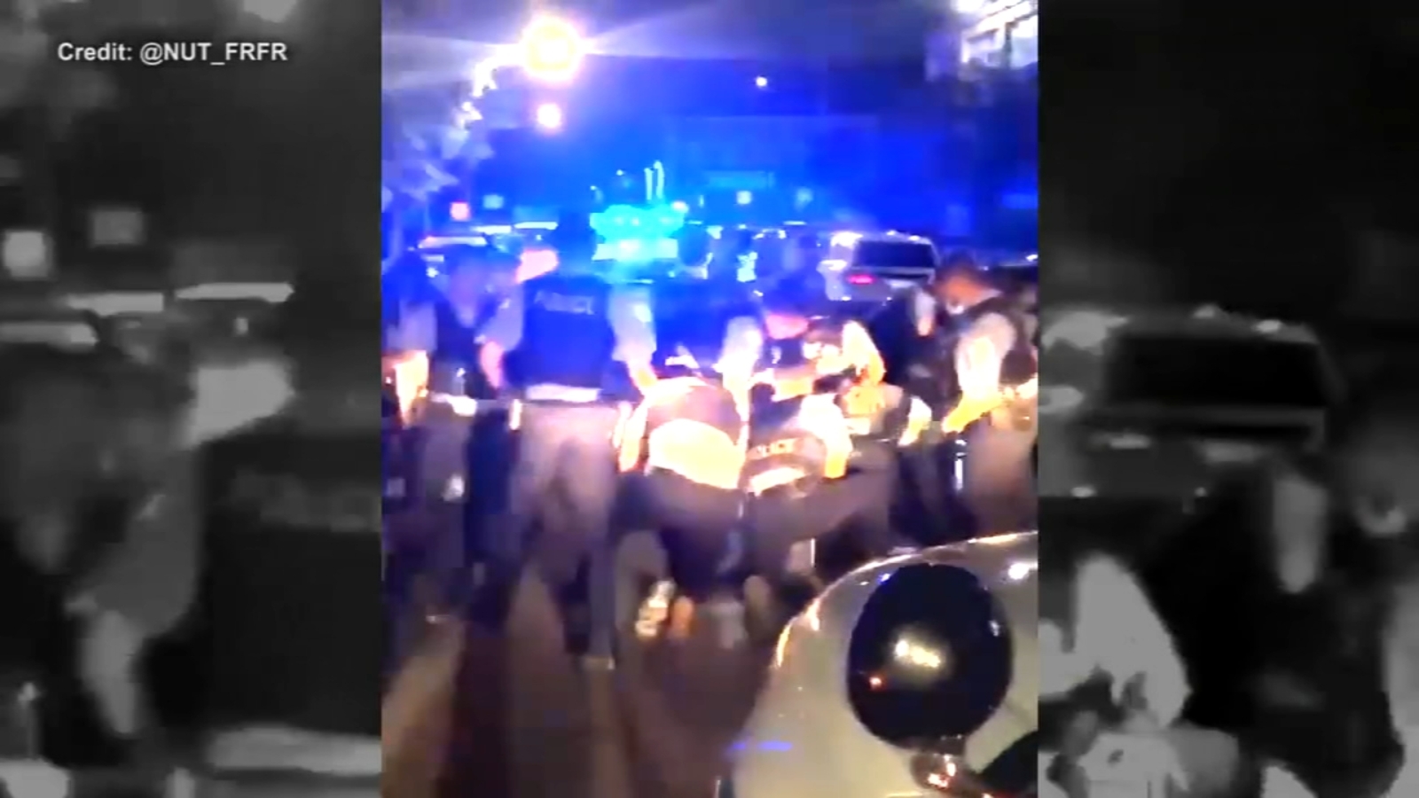 2 Chicago police officers injured while breaking up large crowd in ...