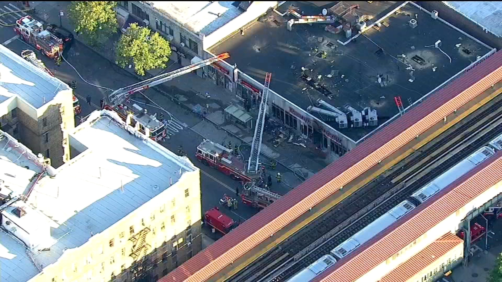 Fire burns through strip mall in Allerton section of Bronx - ABC7 New York