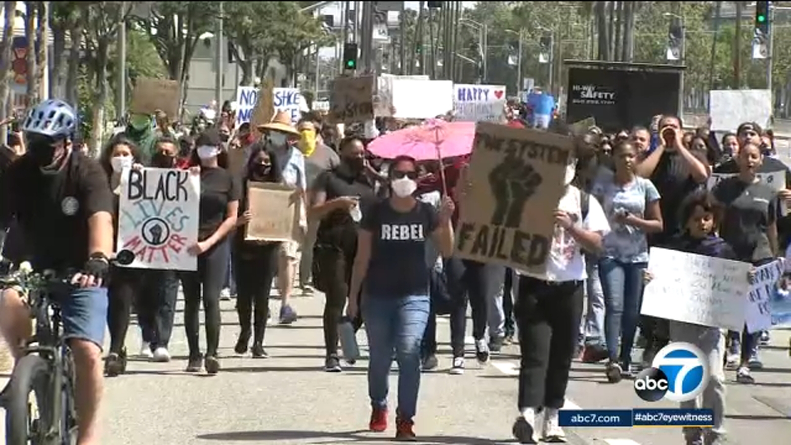 Hundreds join unity march with police against injustice in San Pedro ...