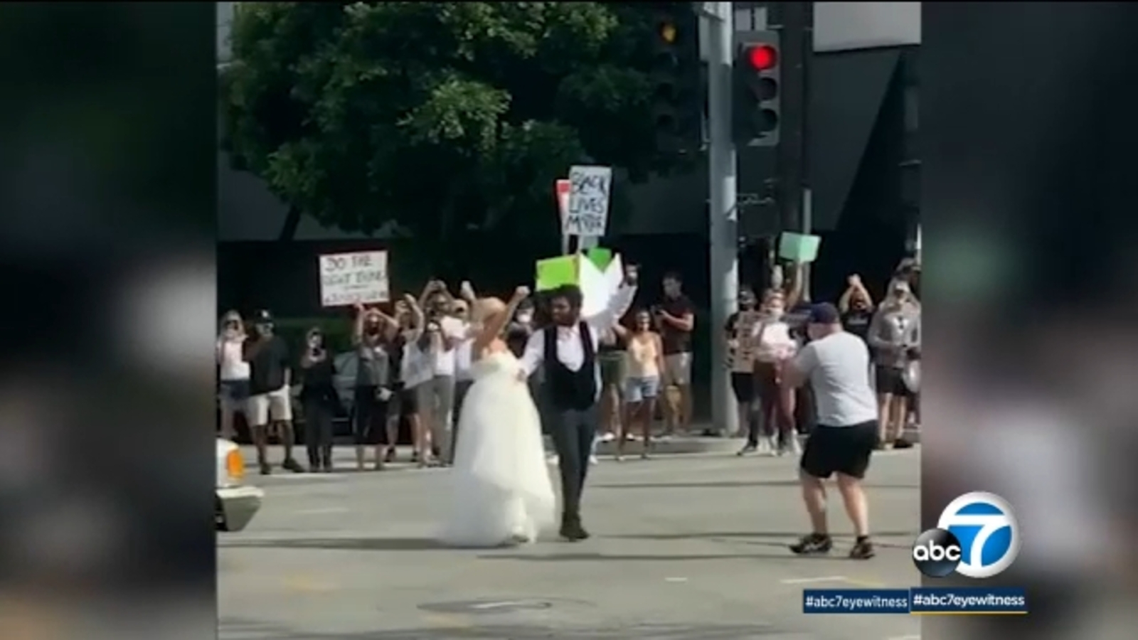 'Monumental for us': Newly married couple spontaneously join LA ...
