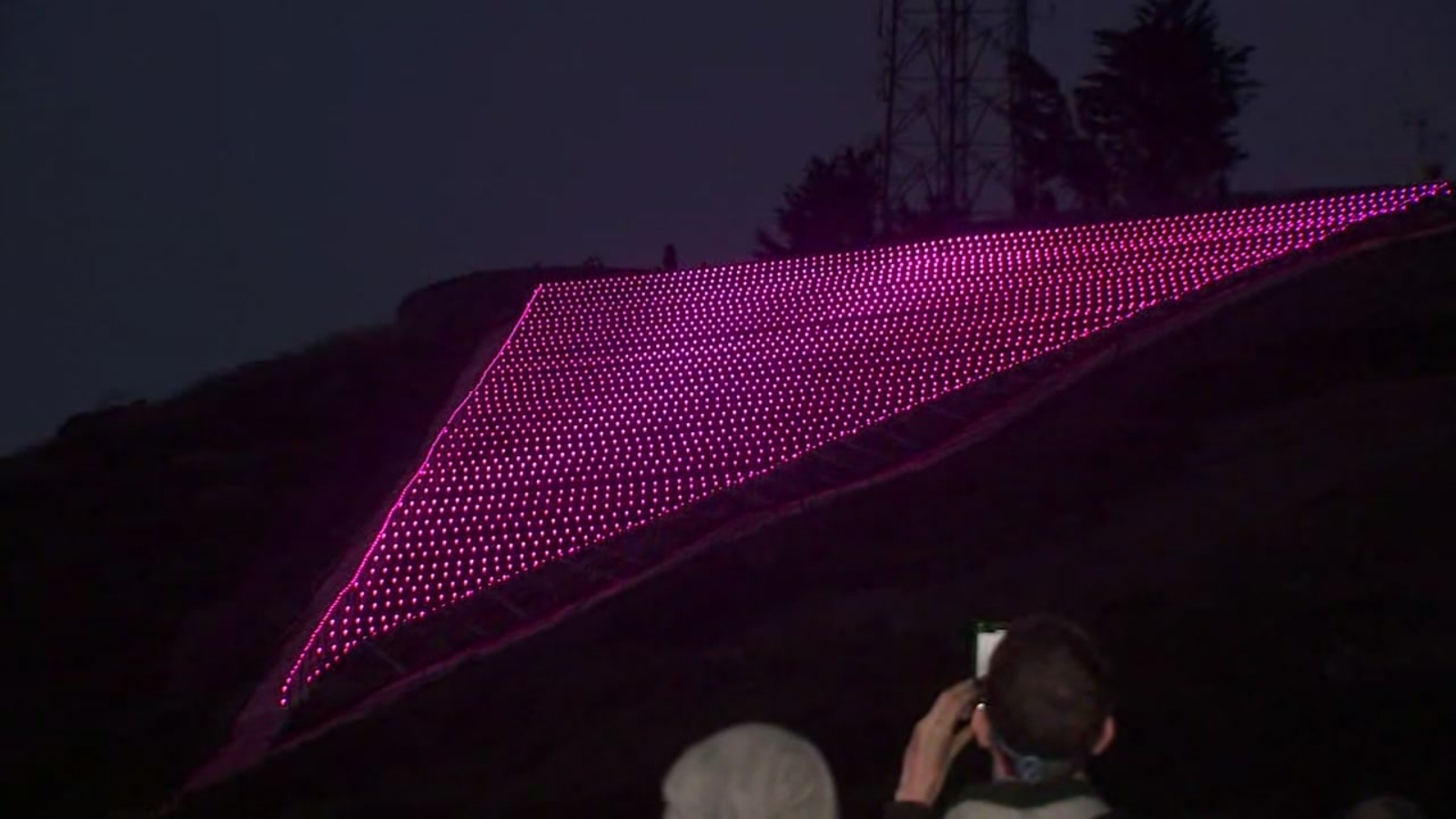 Giant pink triangle illuminates San Francisco's Twin Peaks for Pride ...