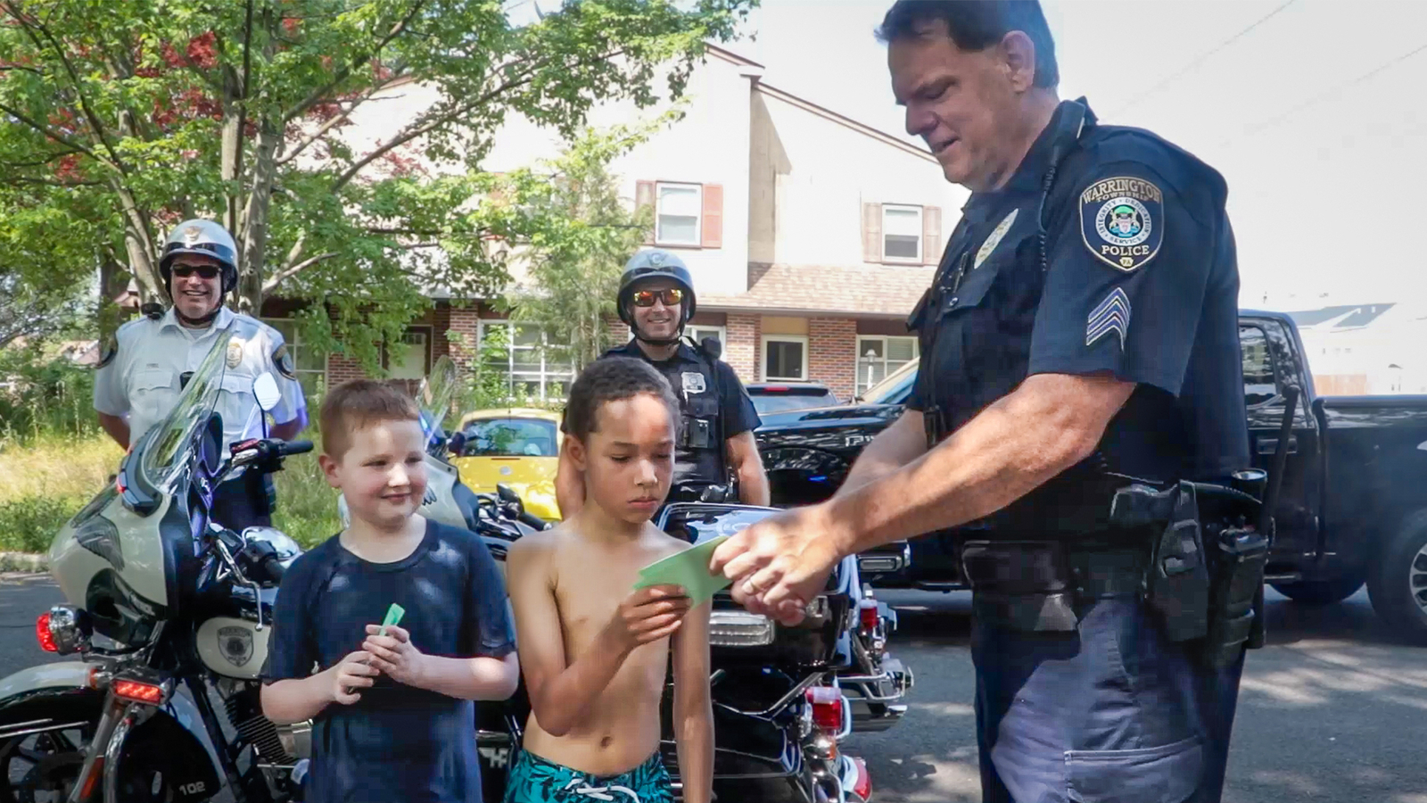 Warrington Police surprise kids with free swim club passes throughout ...