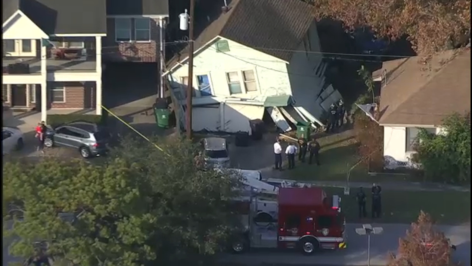 House on cinder blocks falls over onto neighbor's home in Houston's ...